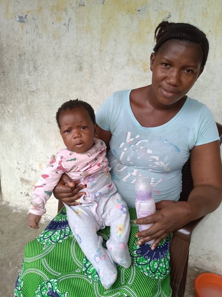 Jatu Dauda with her 7-month-old daughter who was successfully treated ...
